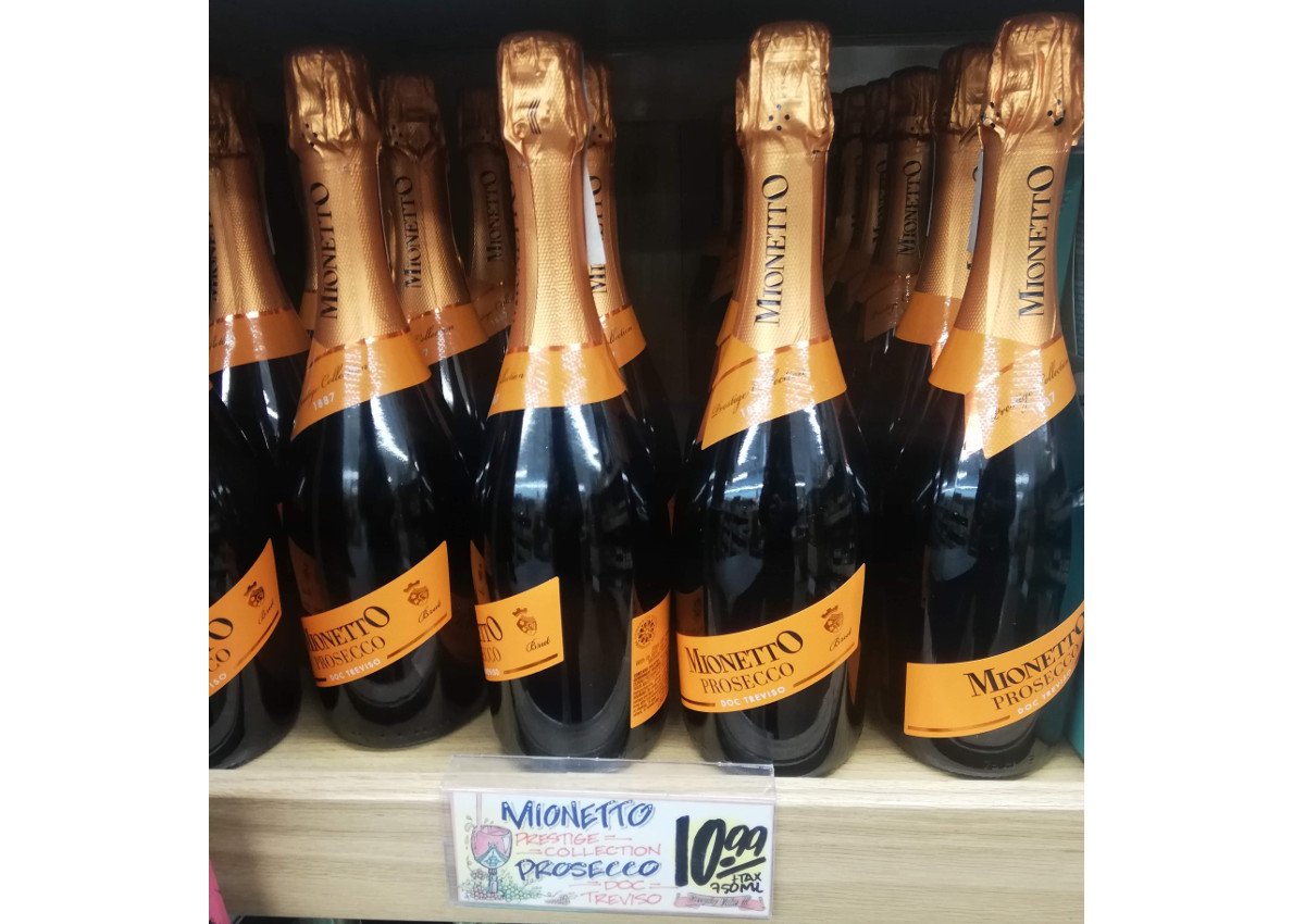 Trader Joe's Italian food: Mionetto Prosecco bottles on a shelf ...